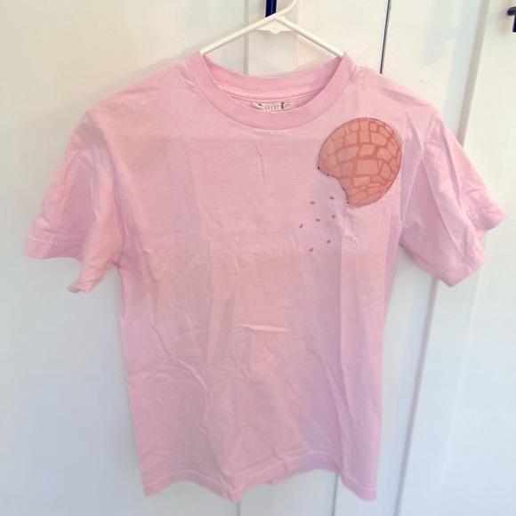 Tops | Raggedy Tiff Tshirt Concha Designed By Jessica Resendiz | Poshmark